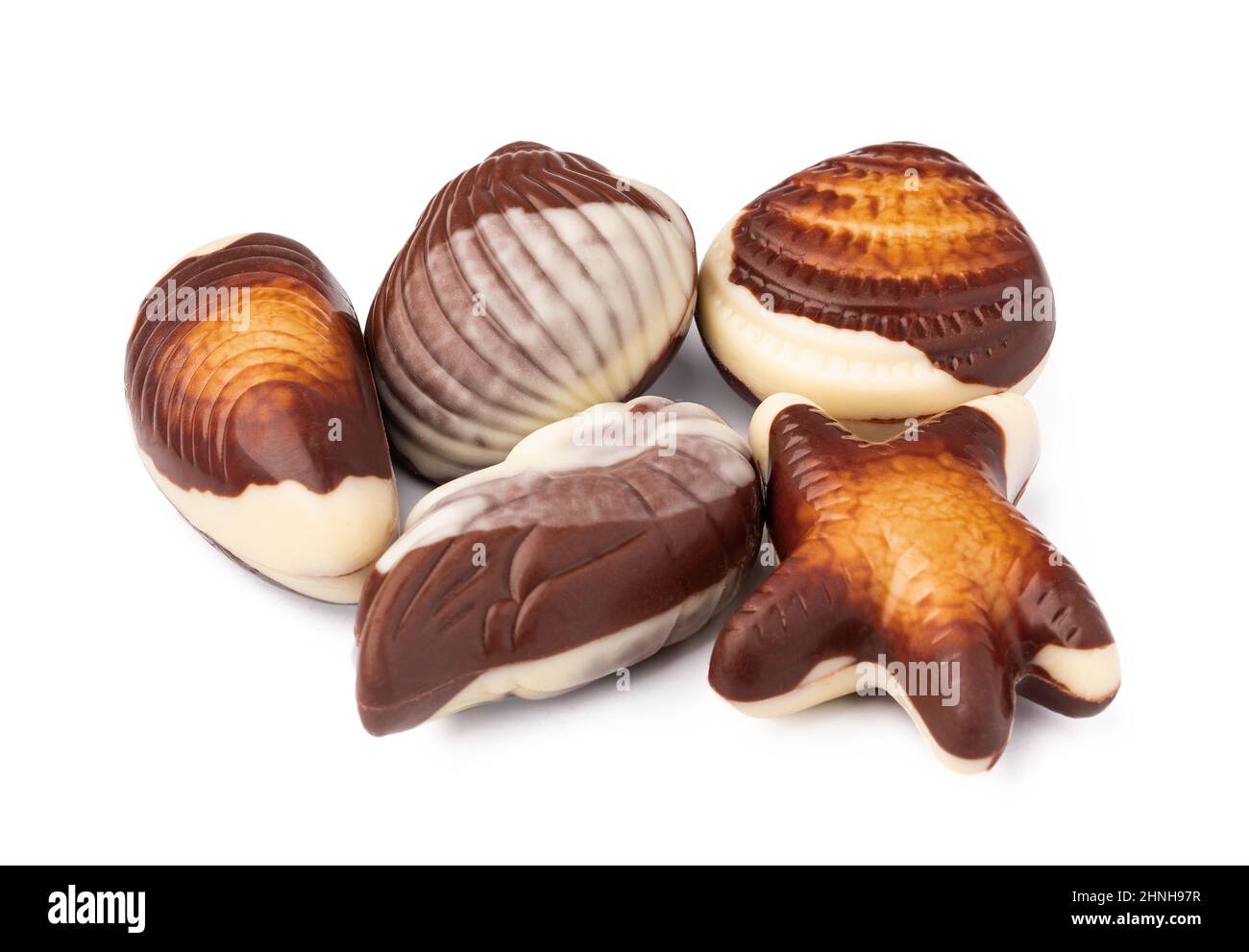 Chocolate sweets shaped as seashells isolated on white background Stock ...