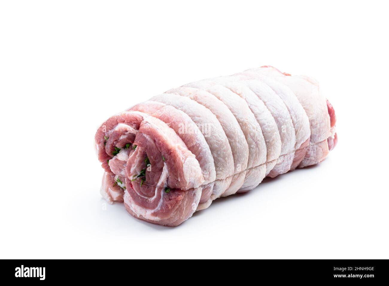 Raw meat roll stuffed with onion and parsley isolated on white Stock ...
