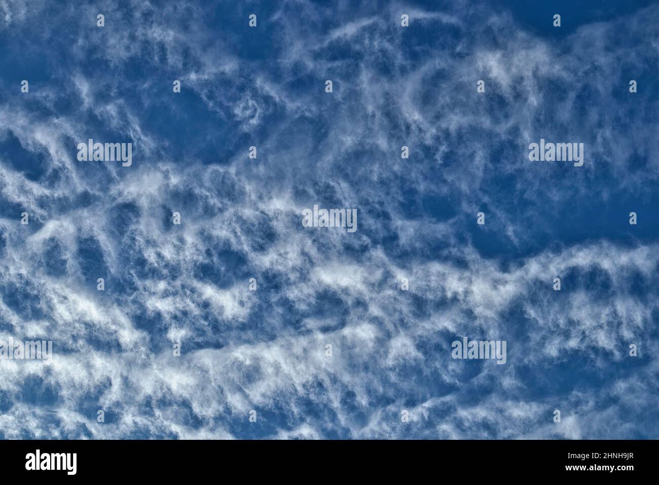 Blue sky ragged cloud hi-res stock photography and images - Alamy