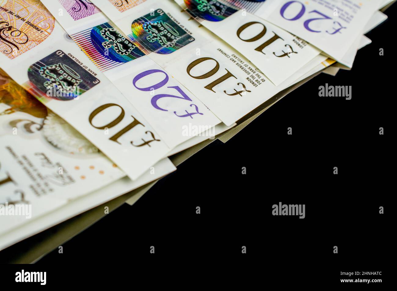 English money on black background Stock Photo - Alamy