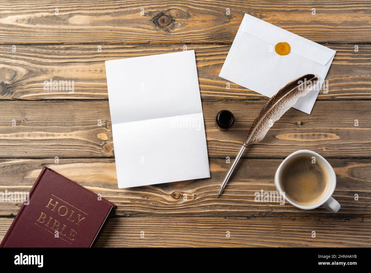 Vintage envelope with empty card, pen on wooden table top view Stock ...