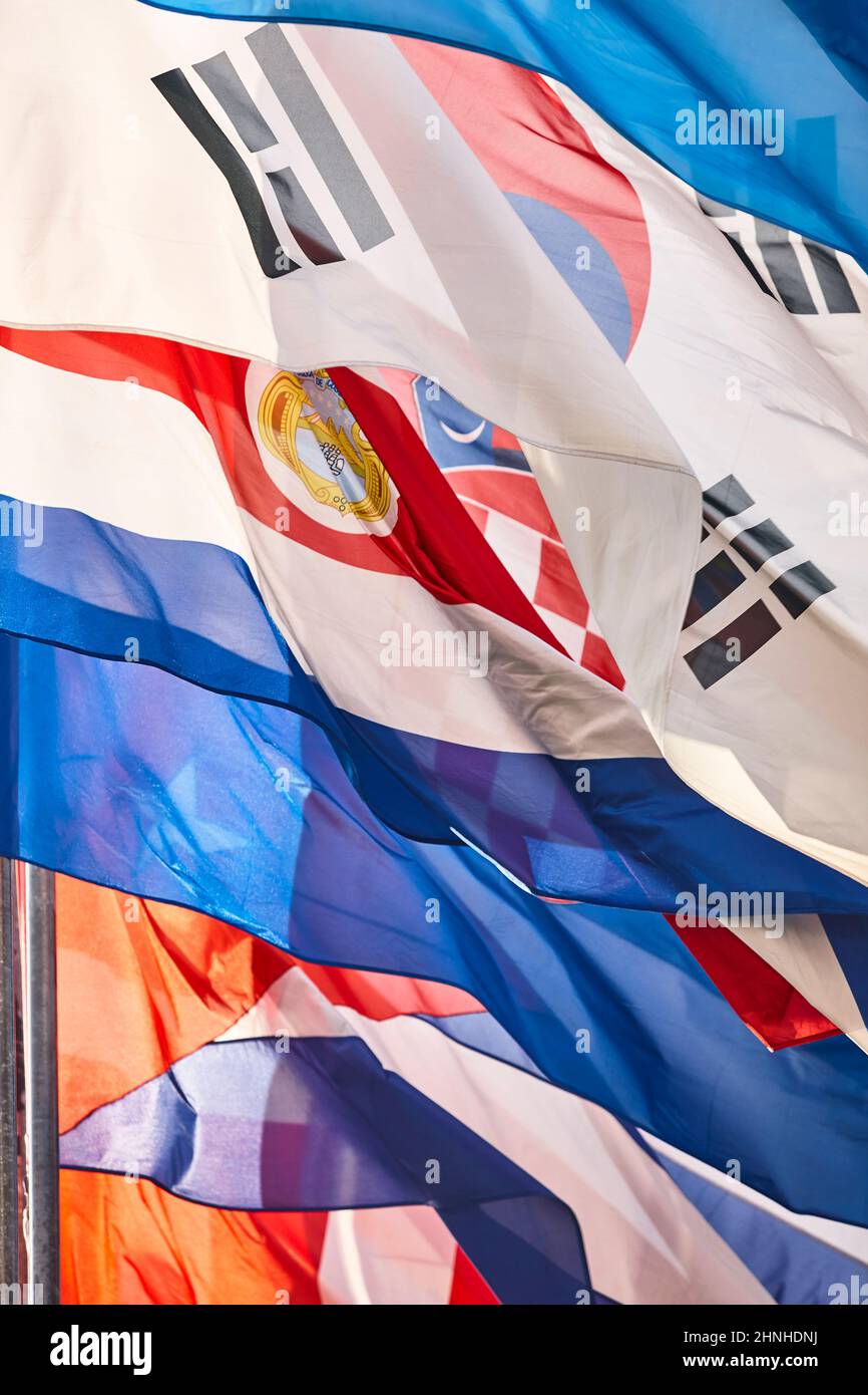 Flags of the word waving in the wind. Nation emblems Stock Photo - Alamy