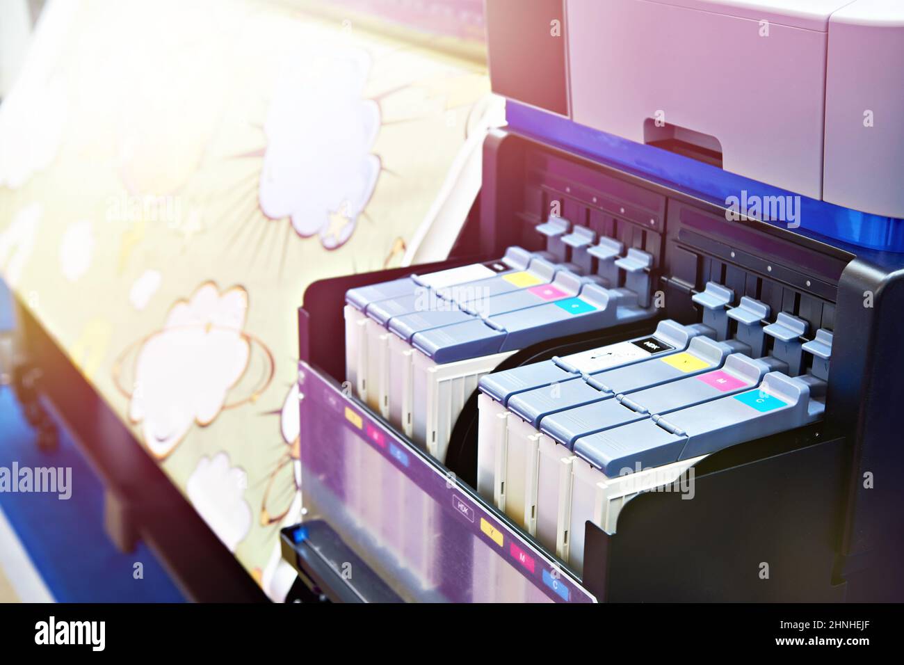 Ink in cartridges and plotter on fabric and paper Stock Photo - Alamy