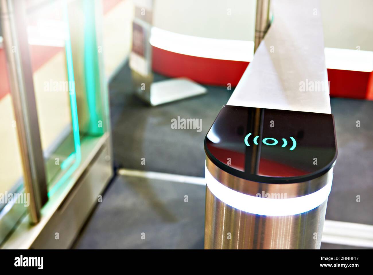 Modern baffle gate or turnstile go green sign Stock Photo - Alamy