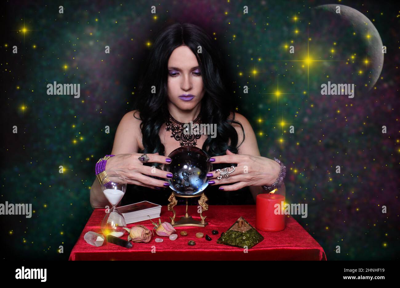 Psychic with crystal ball and tarot cards Bright Galaxy Background ...