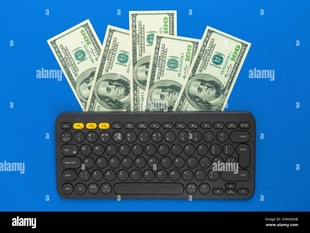 Keyboard typing the money. Freelance concept, concept of work at home ...