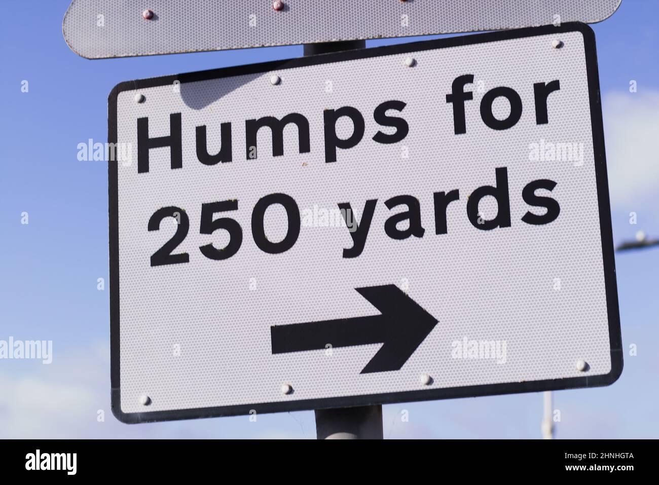 Motoring - Road Sign of Humps in road for 250 Yards Stock Photo - Alamy