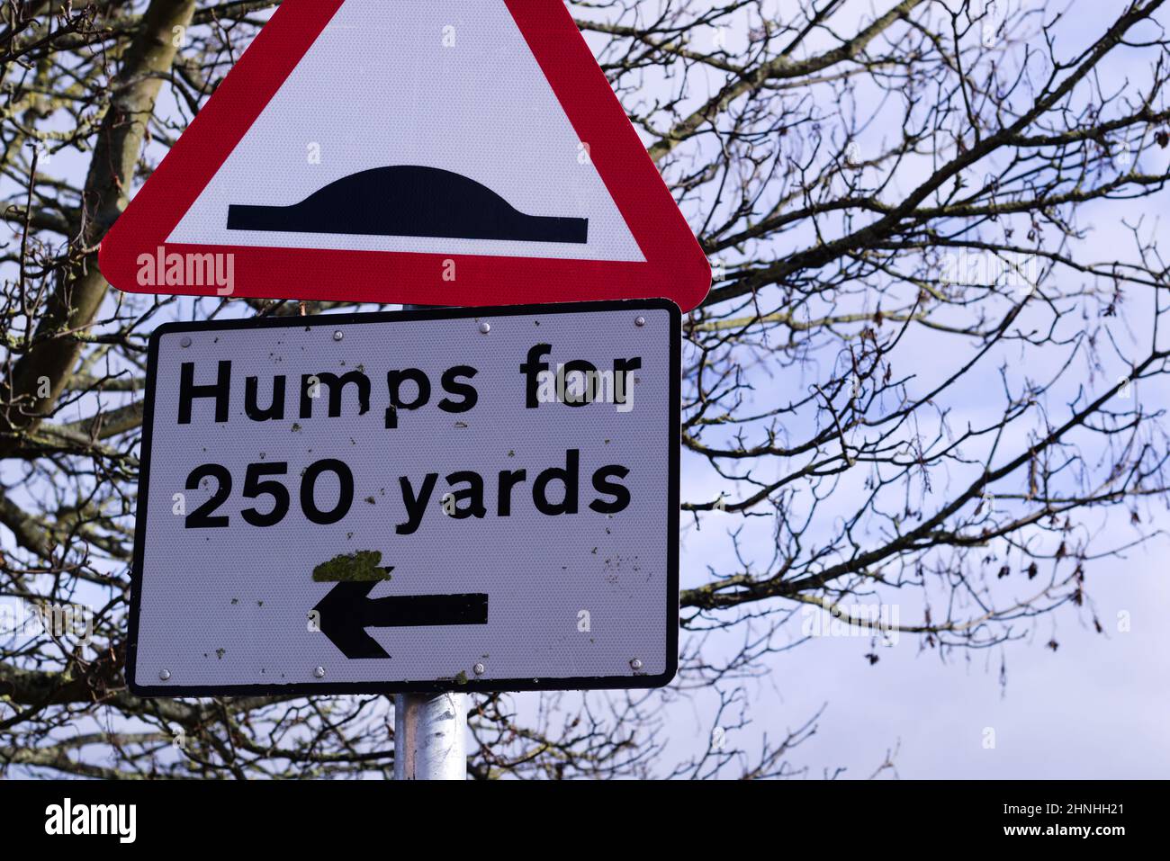 Motoring - Road Sign of Humps in road for 250 Yards Stock Photo - Alamy