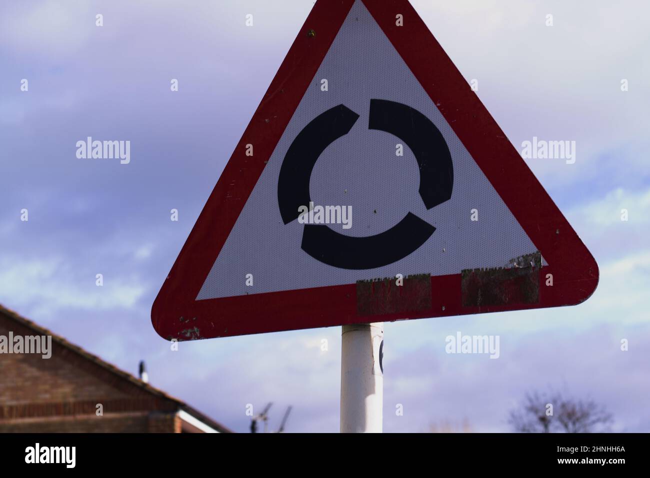 Close-up of a Roundabout / Road Traffic Sign Stock Photo - Alamy