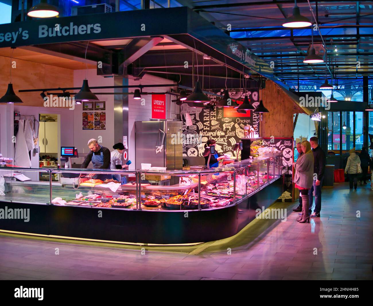 Local butcher counters and their customers in the new Market Hall in ...