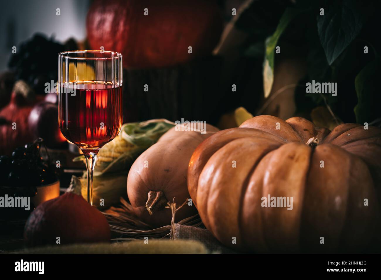 Glass of Cider in moody autumn atmosphere with Dabinett apple in ...