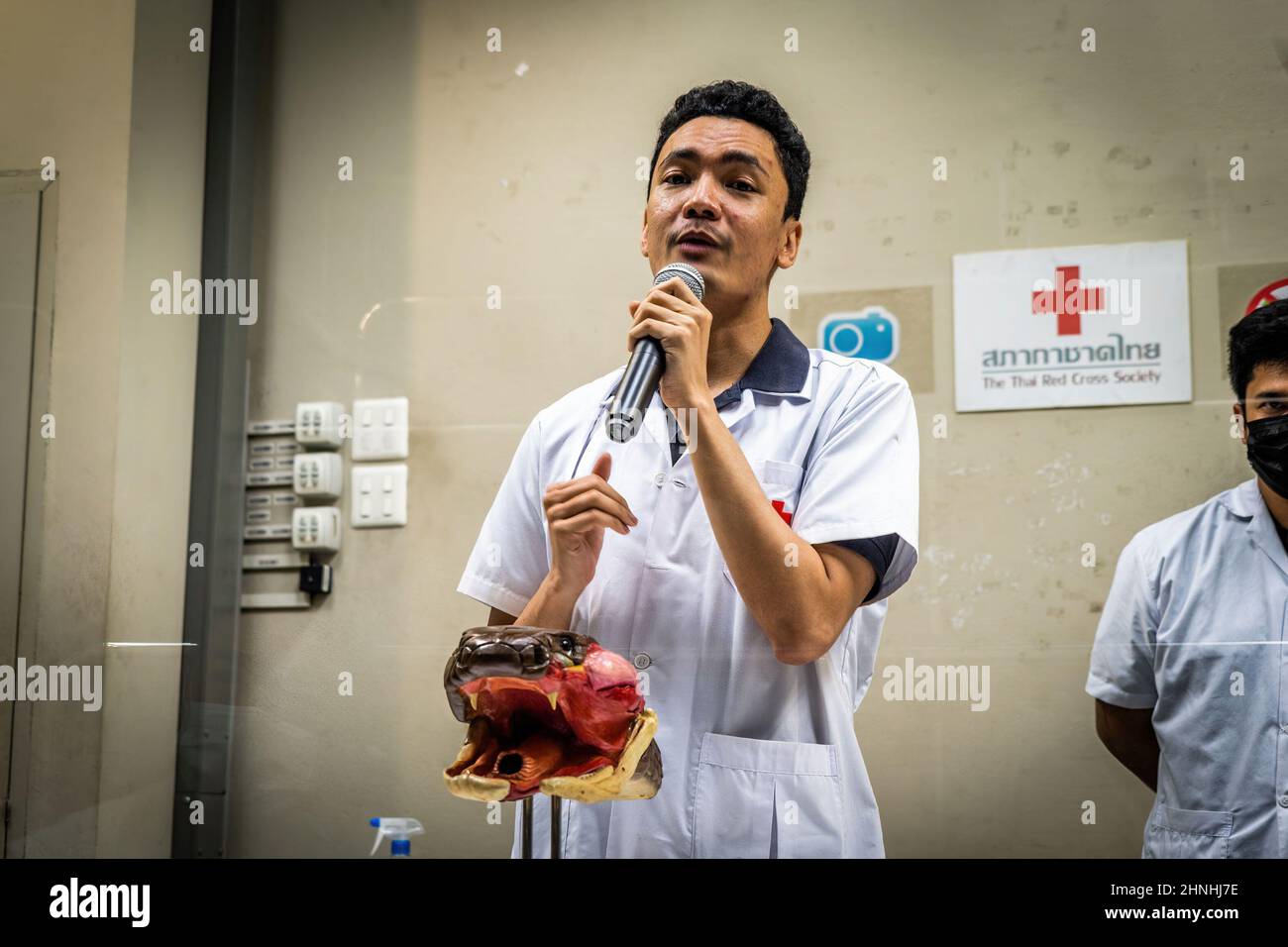 Thai Red Cross employee teach an audience about the history and mission ...