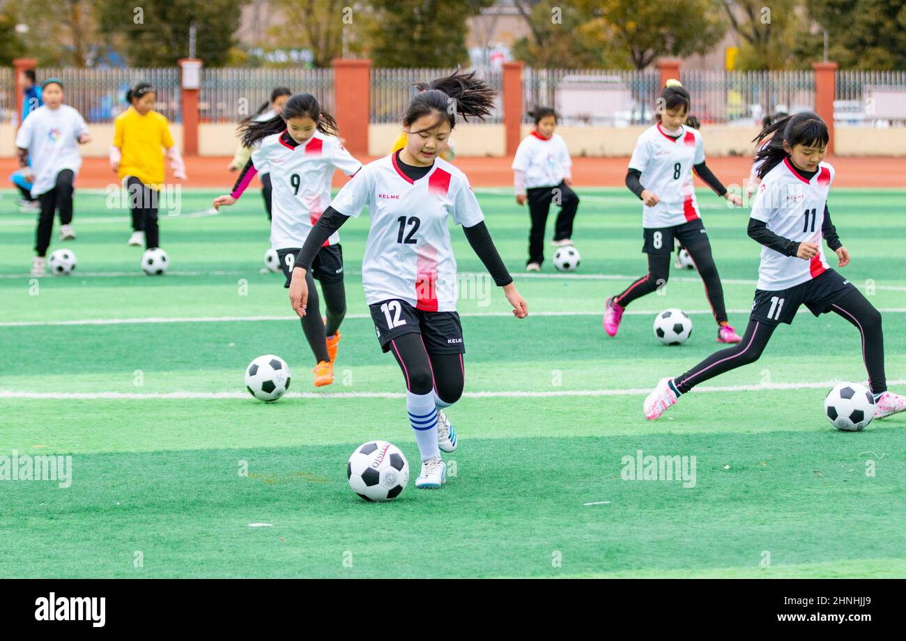 HAI'AN, CHINA - FEBRUARY 17, 2022 - Children of a girls' soccer club at ...