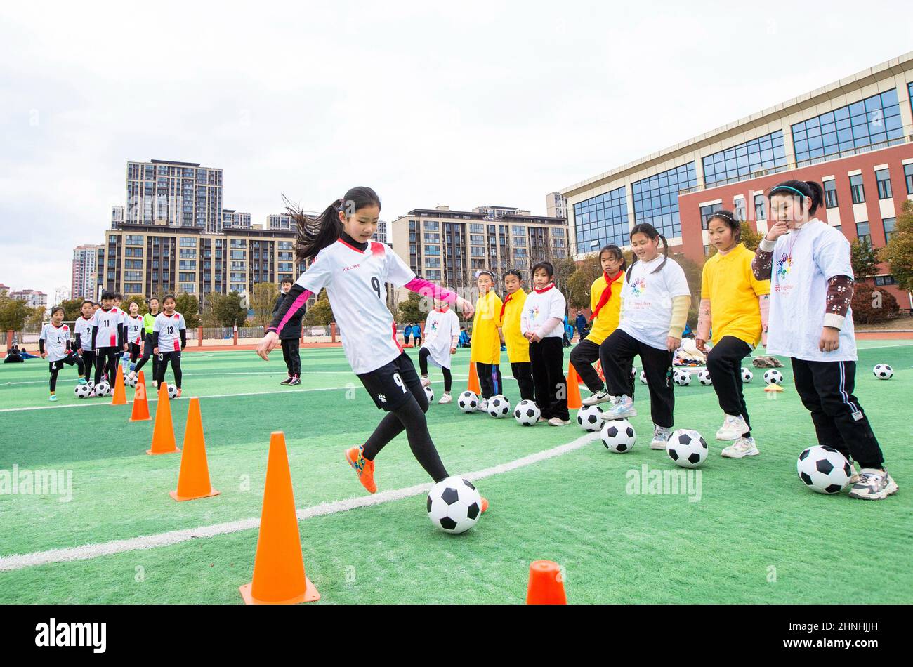 HAI'AN, CHINA - FEBRUARY 17, 2022 - Children of a girls' soccer club at ...