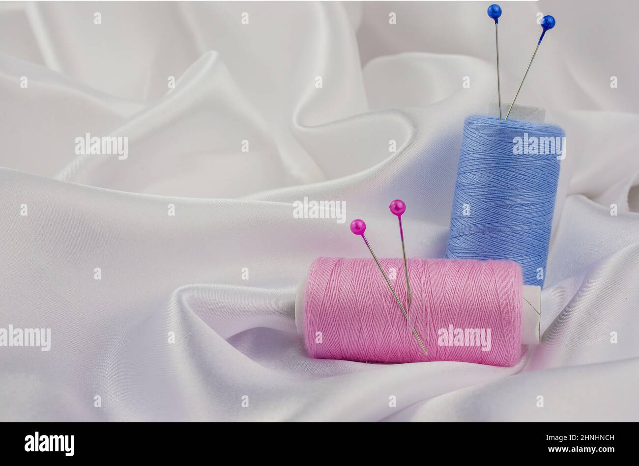 set of colouring threads on colourful background Stock Photo - Alamy