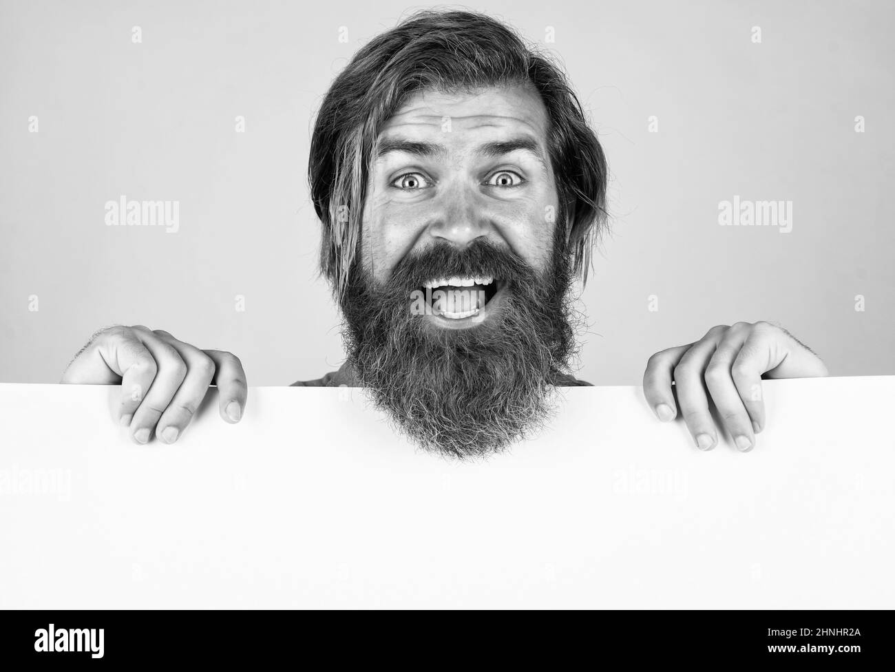Banner business man holding Black and White Stock Photos & Images - Alamy