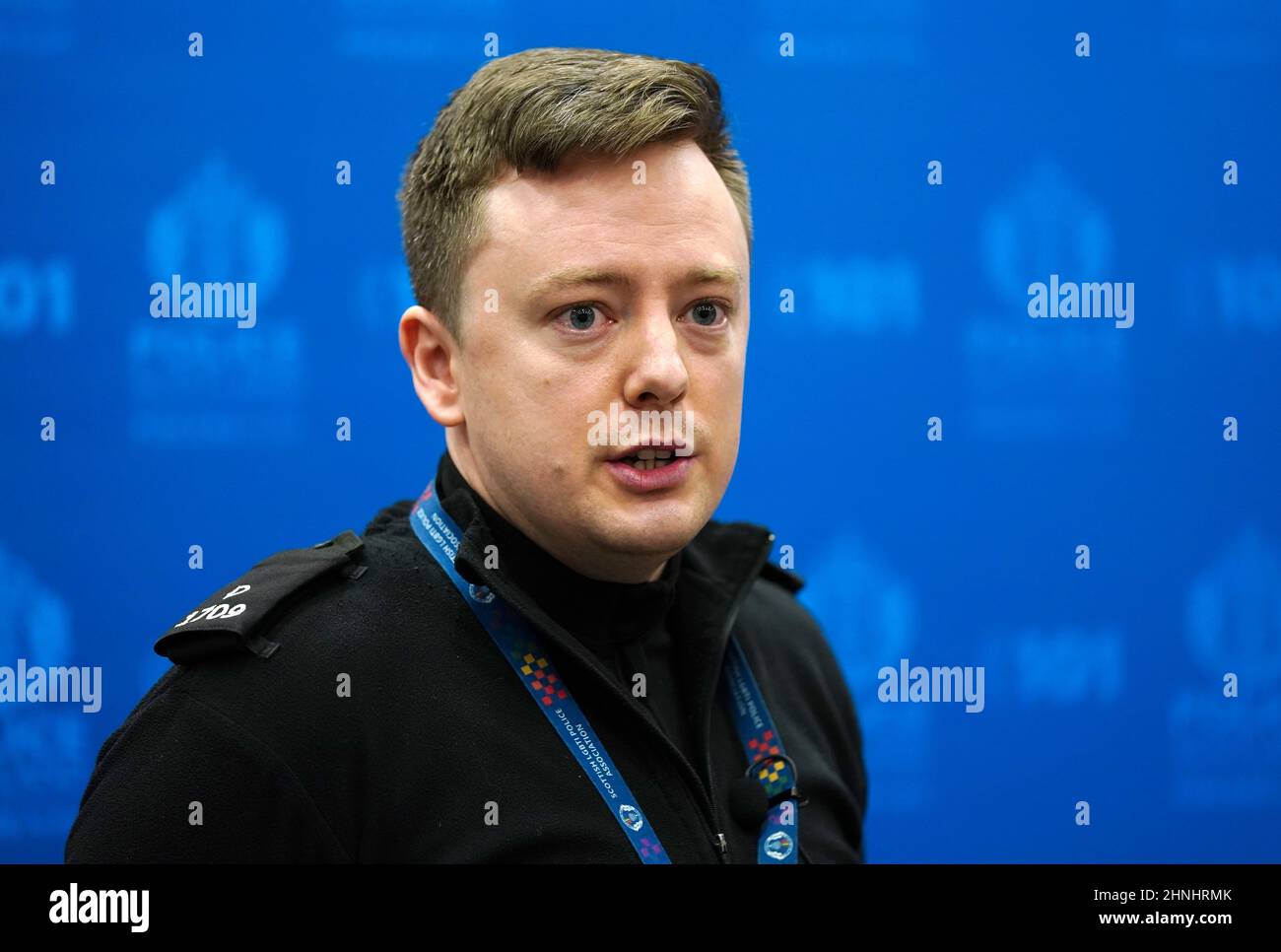 Police Scotland's PC Ross Hunter talks to the media as all officers ...