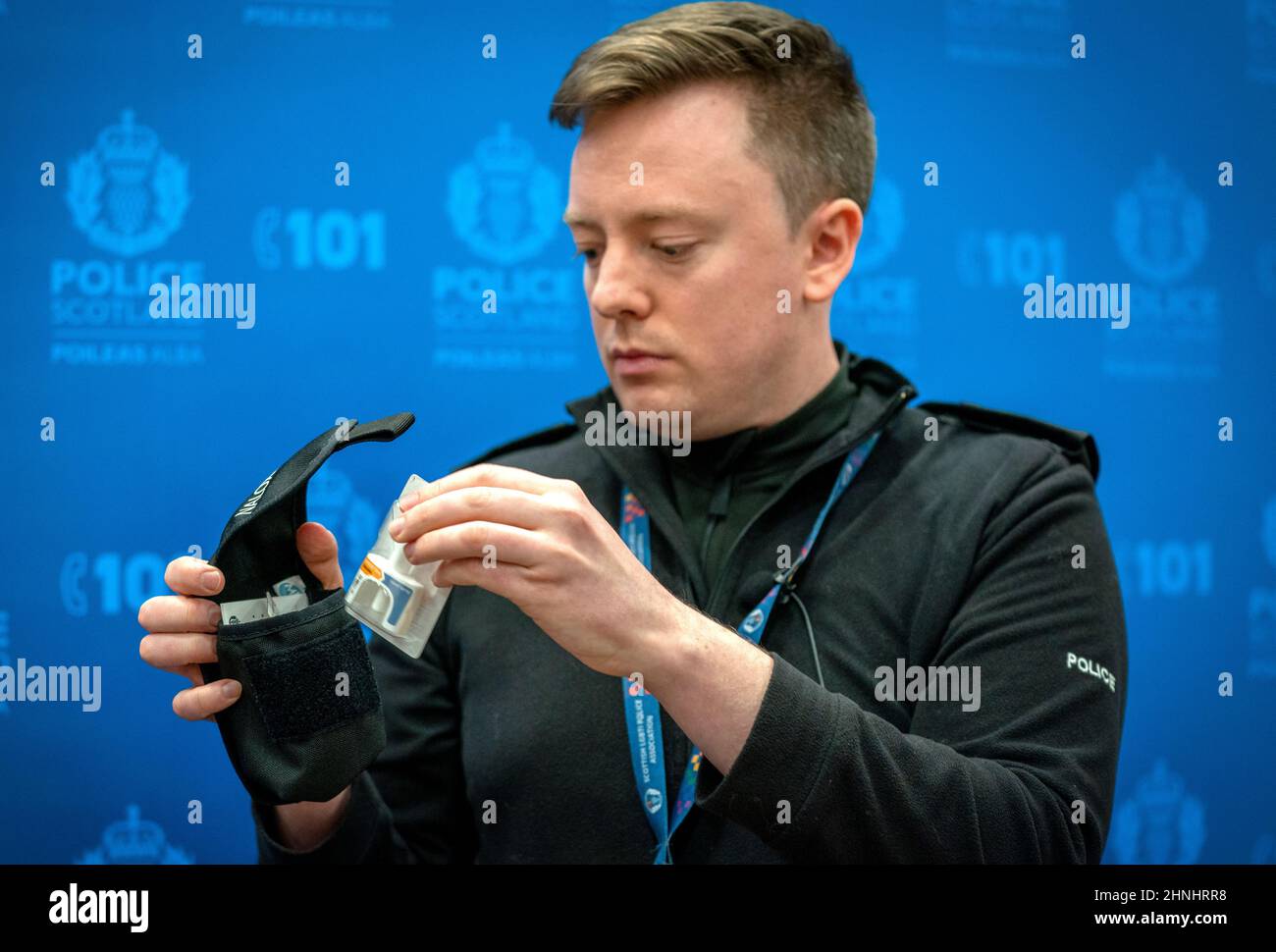 Police Scotland's PC Ross Hunter shows the media a naloxone nasal spray ...