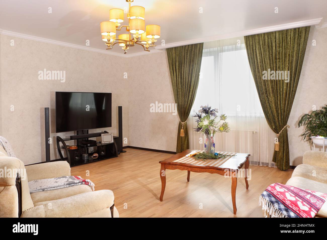 New room interior with black sofa and tv Stock Photo - Alamy