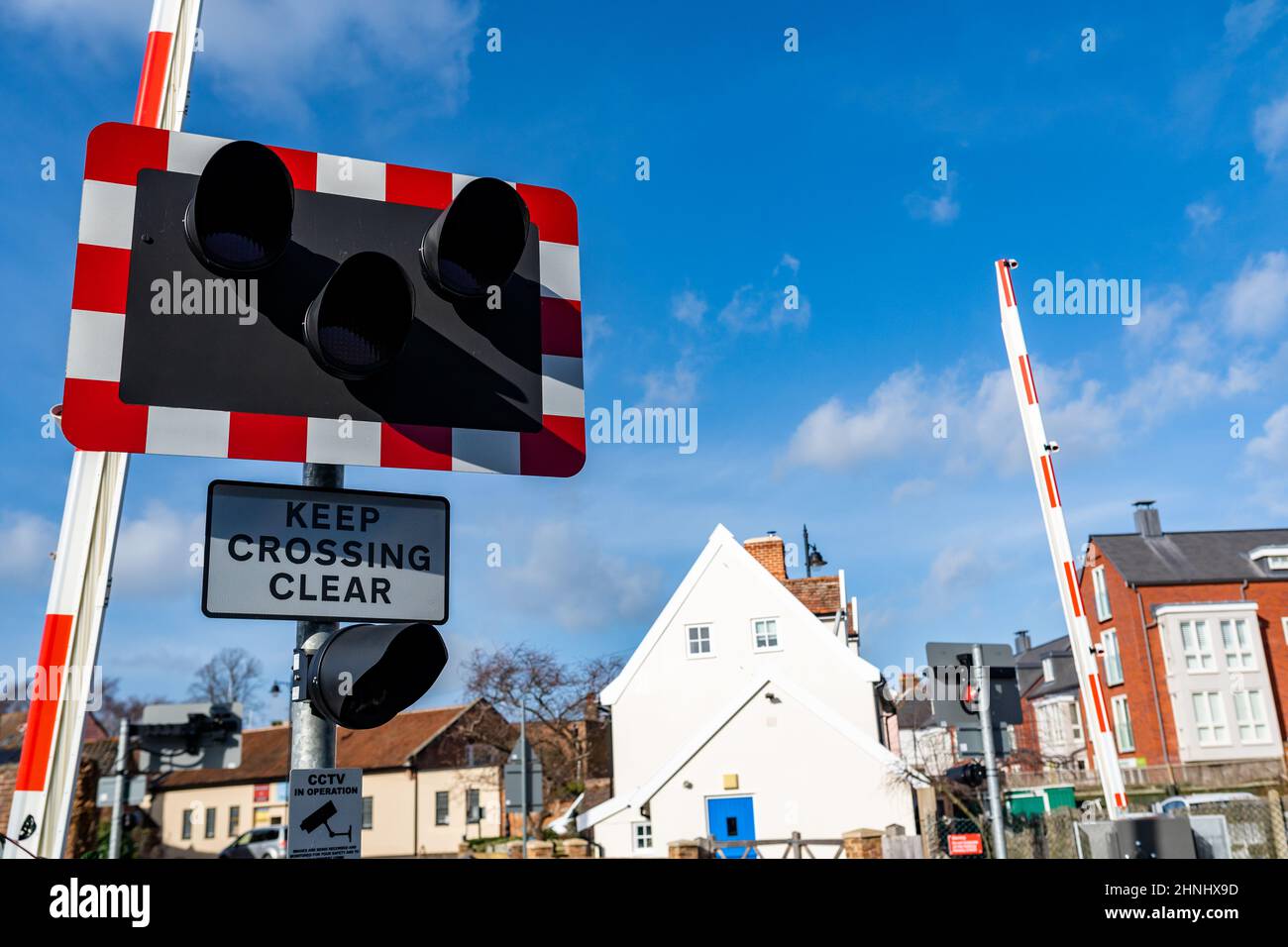 Keep crossing clear sign on a busy level crossing on the mainline to ...