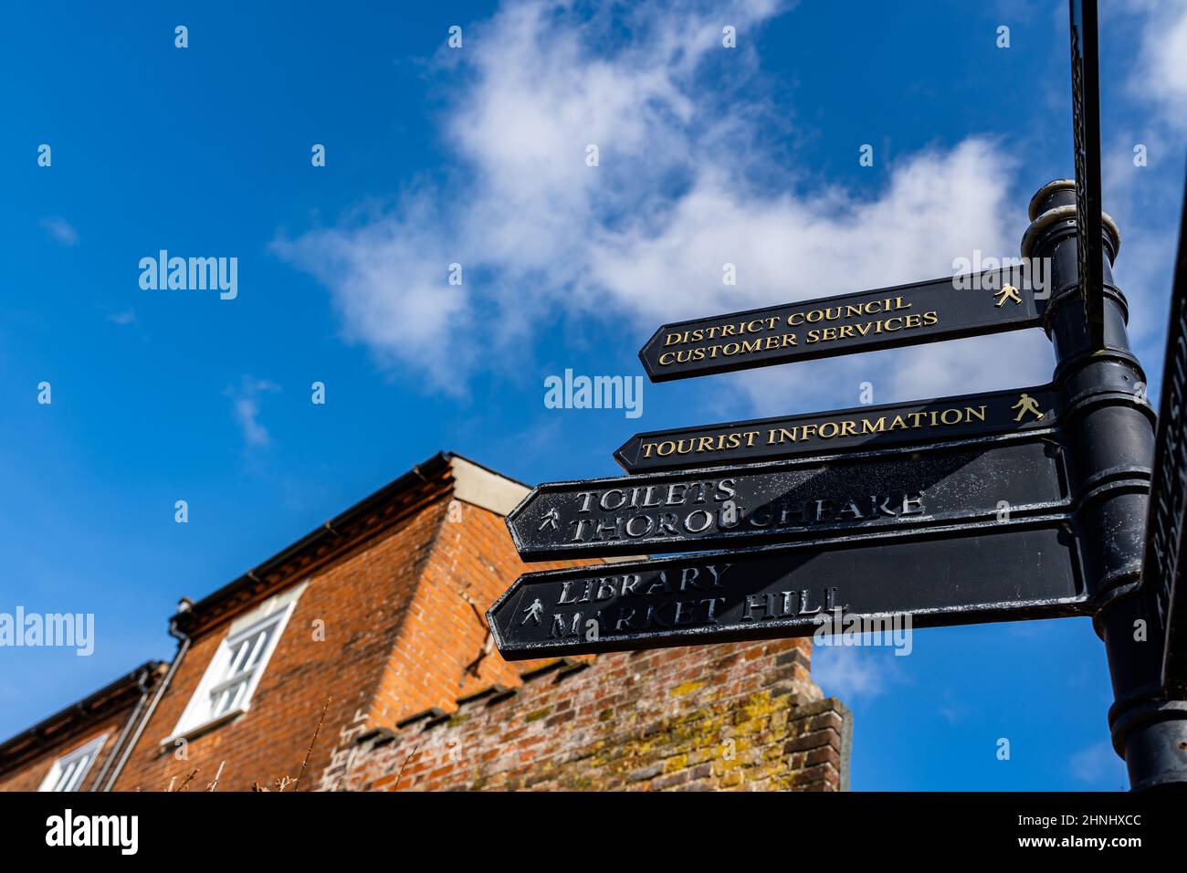 Public information sign showing the direction to different attractions ...