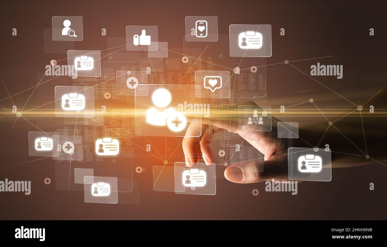 Hand pressing social media multimedia application screen with media ...