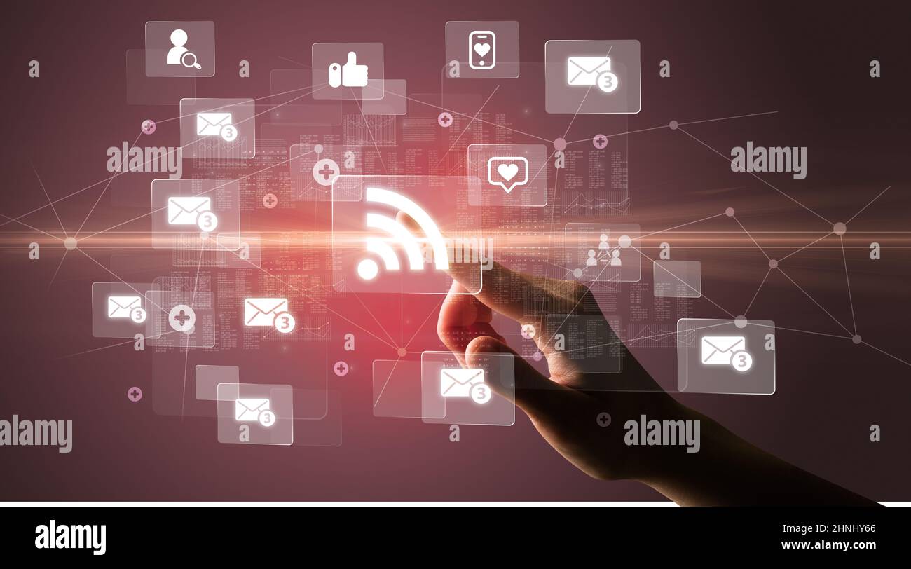 Hand pressing social media multimedia application screen with media ...