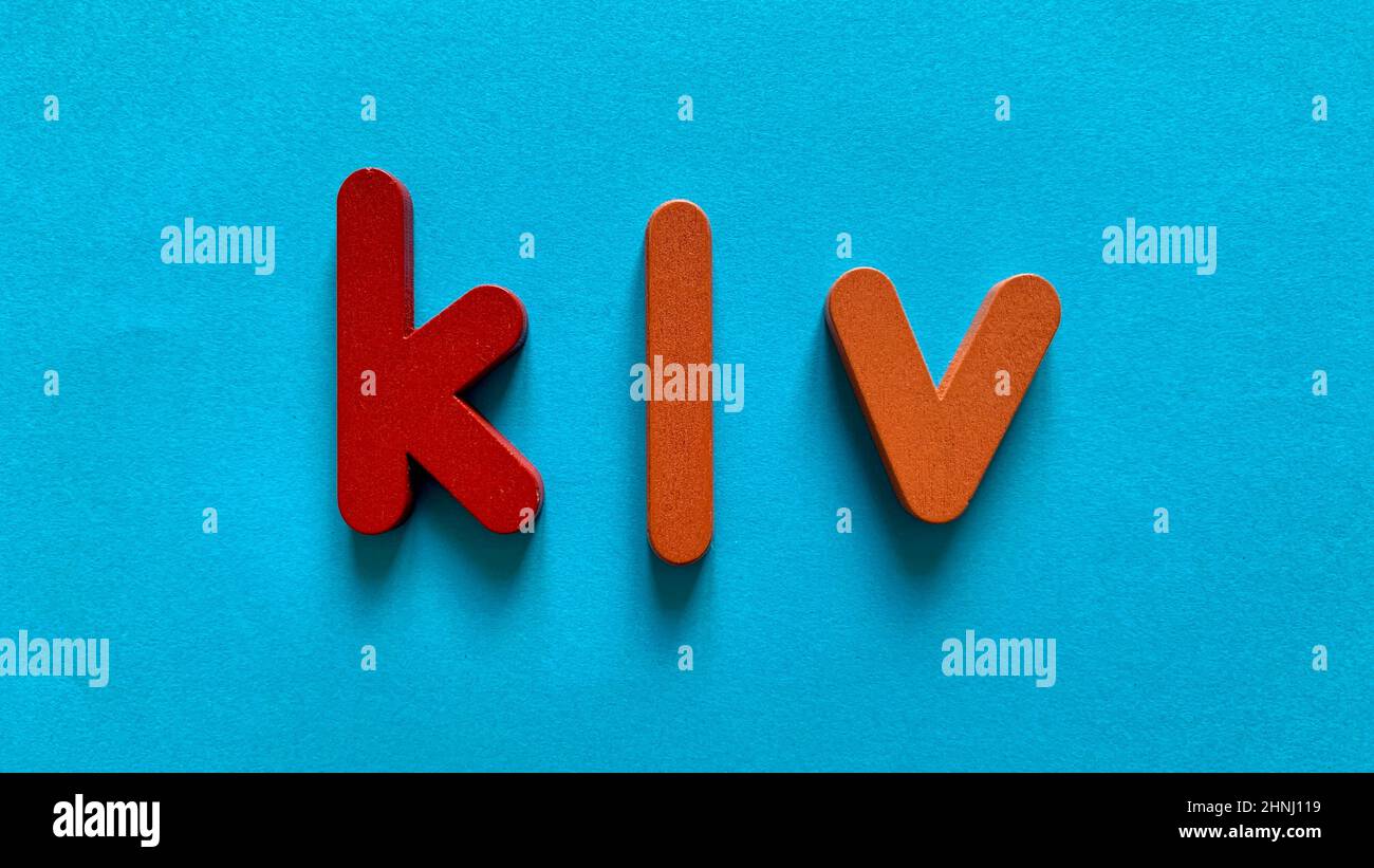 letter with K I V on blue background desk. Business concept Stock Photo ...