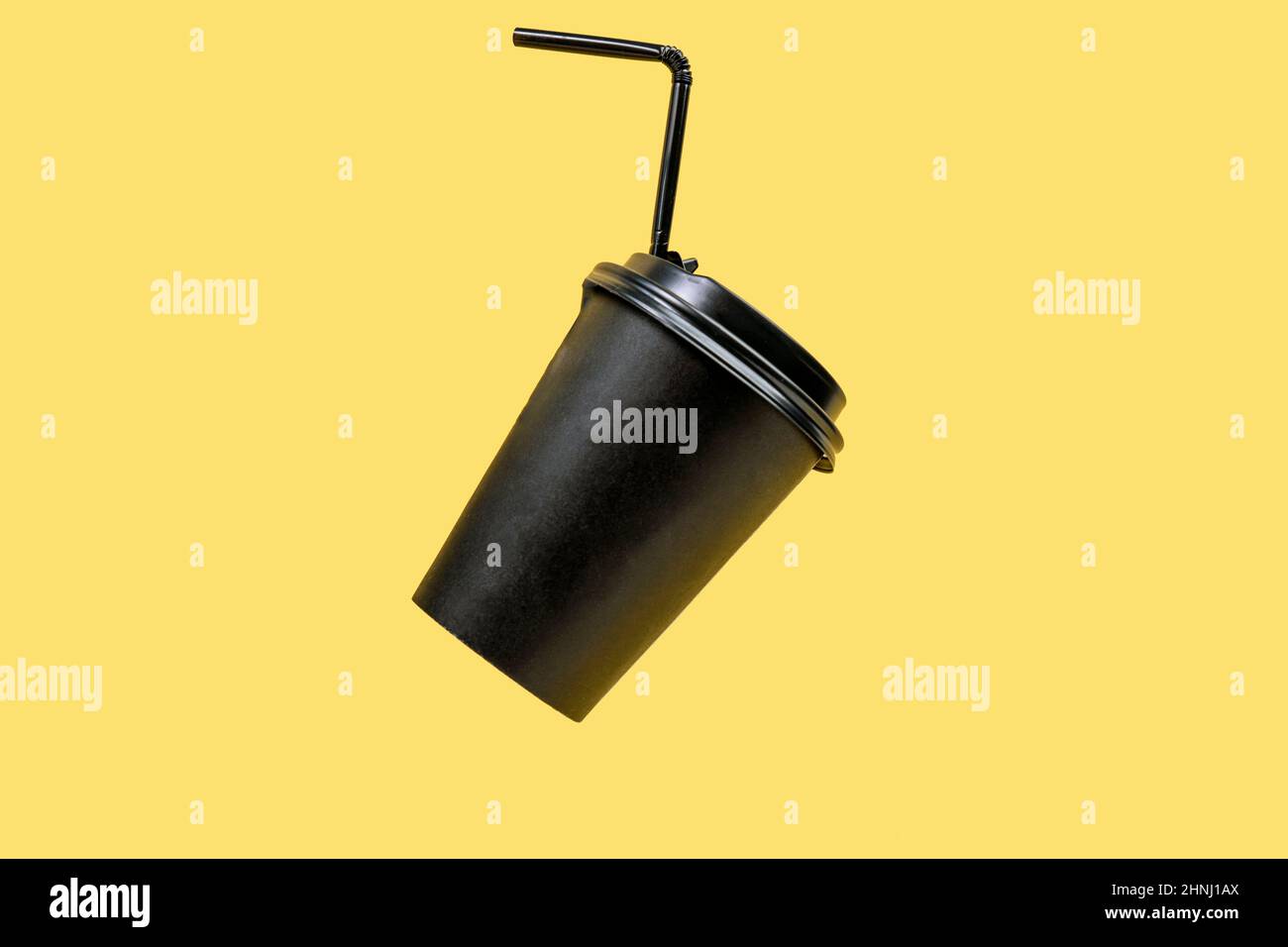 Coffee cup fly on yellow background. Coffee container mock up, blank ...