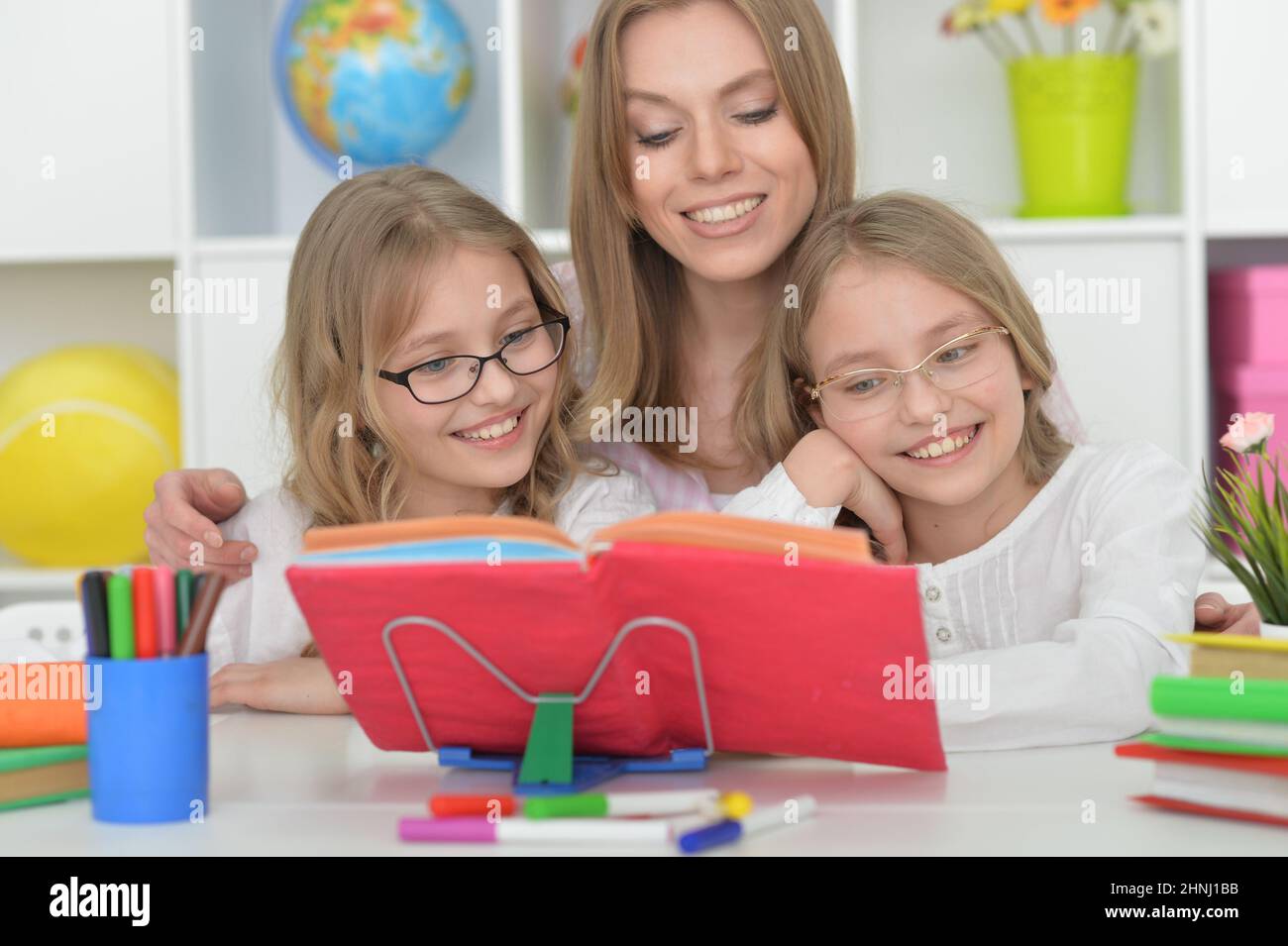 Pretty woman teaching class hi-res stock photography and images - Alamy