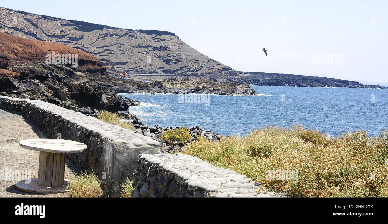 Typical house with backyard and sea in El Golfo, Lanzarote, Canary ...