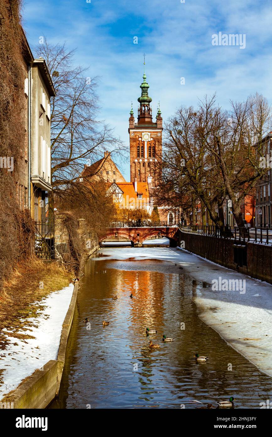 Old Town in Danzig in winter scenery. Radunia canal and view on St ...