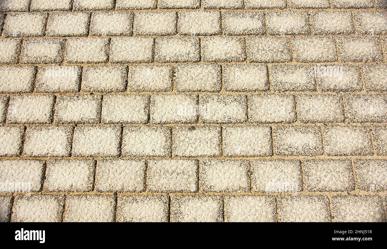 Gray colored brick paving on a street in Spain, Europe Stock Photo - Alamy