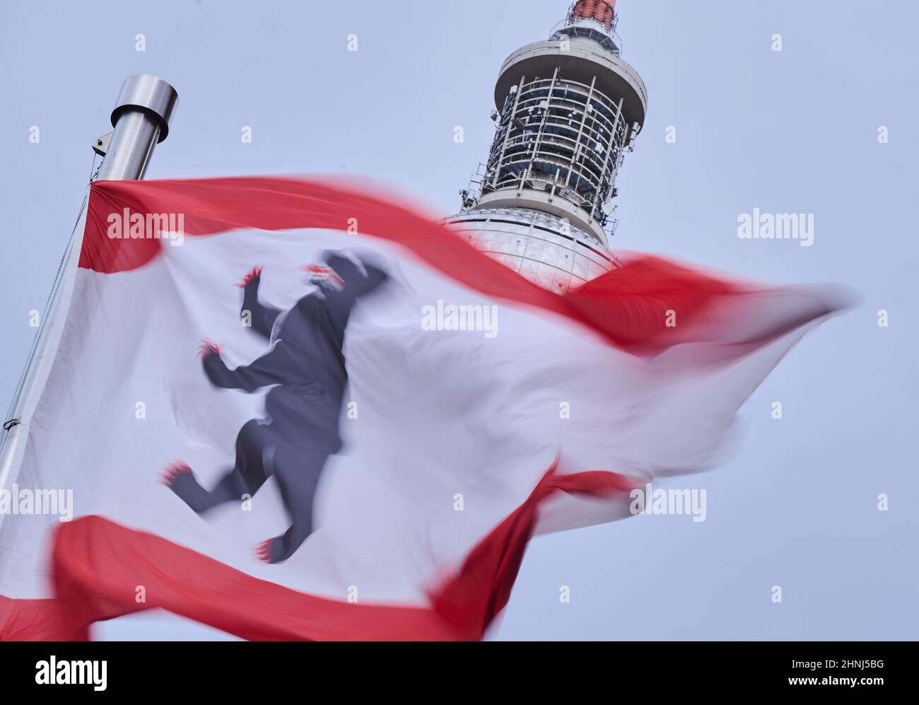 Berlin, Germany. 17th Feb, 2022. The flag of Berlin flies between the ...