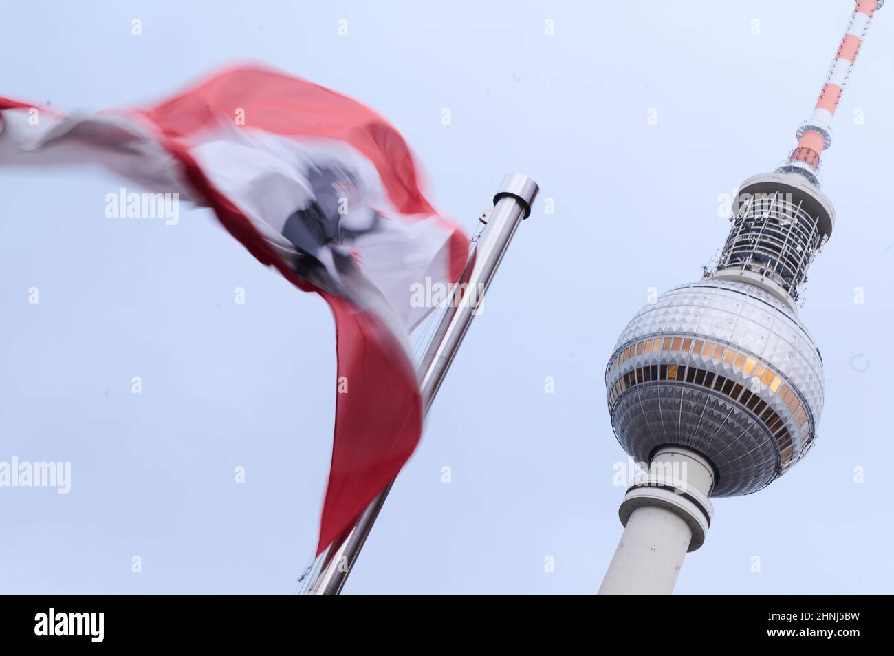 Berlin, Germany. 17th Feb, 2022. The flag of Berlin flies between the ...