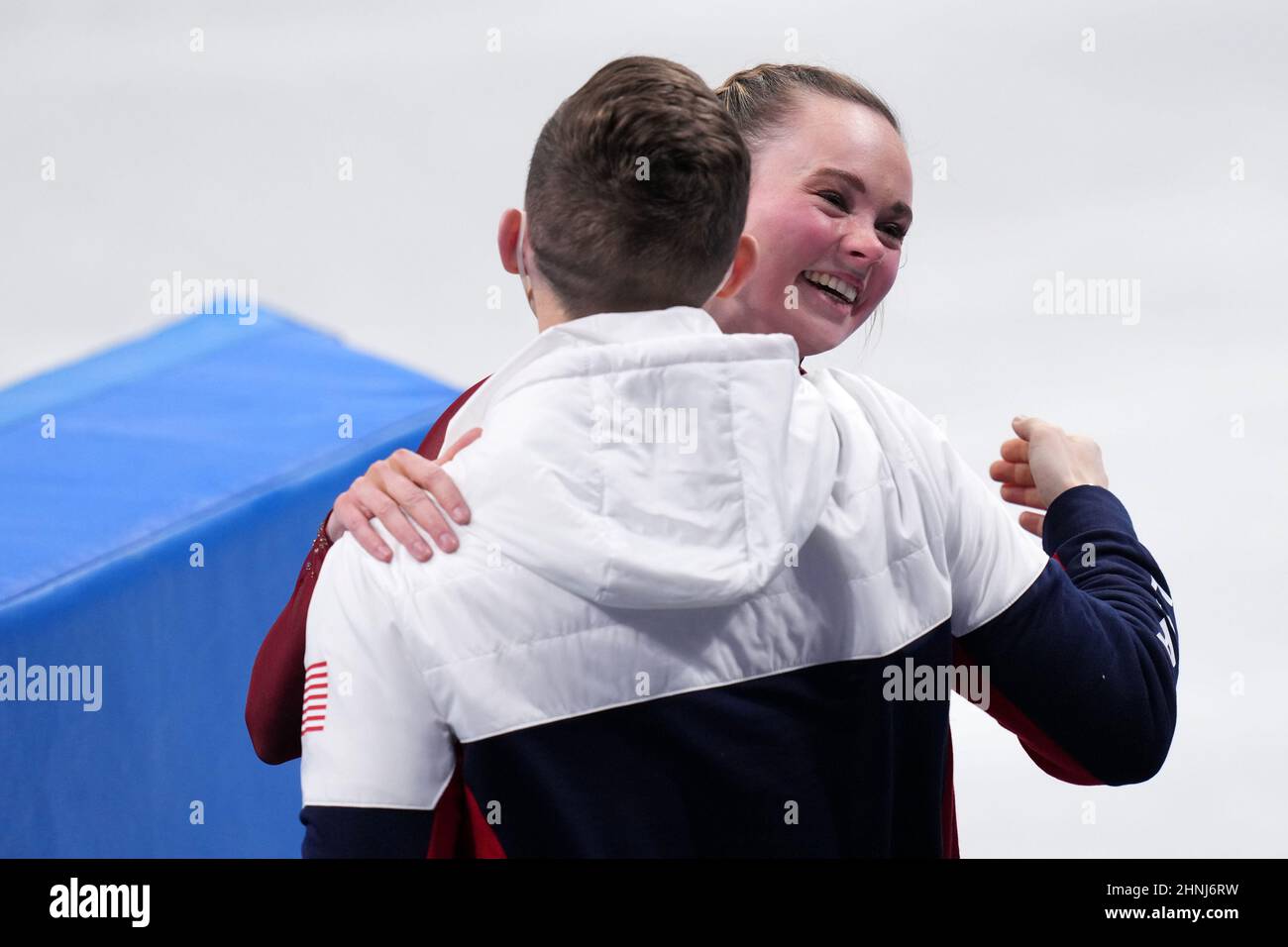 Beijing, China. 17th Feb, 2022. Mariah Bell of the USA, hugs coach Alex ...