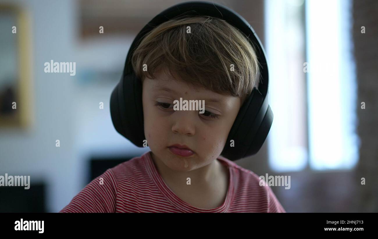 Little boy wearing headphones closeup face Stock Photo - Alamy
