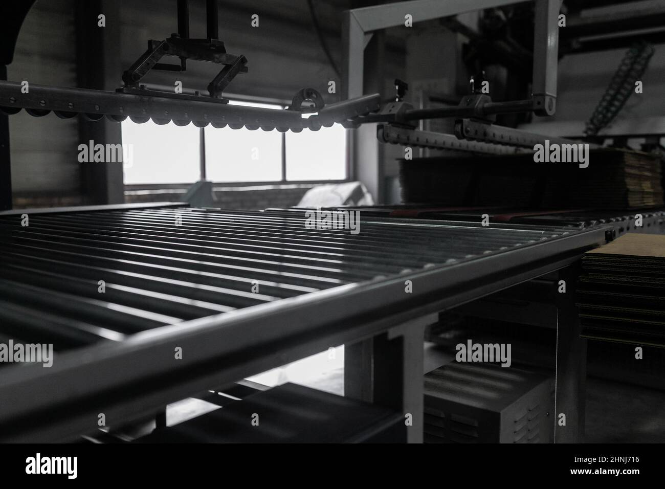 Close-up on a conveyor belt. Rejection of human power Stock Photo - Alamy