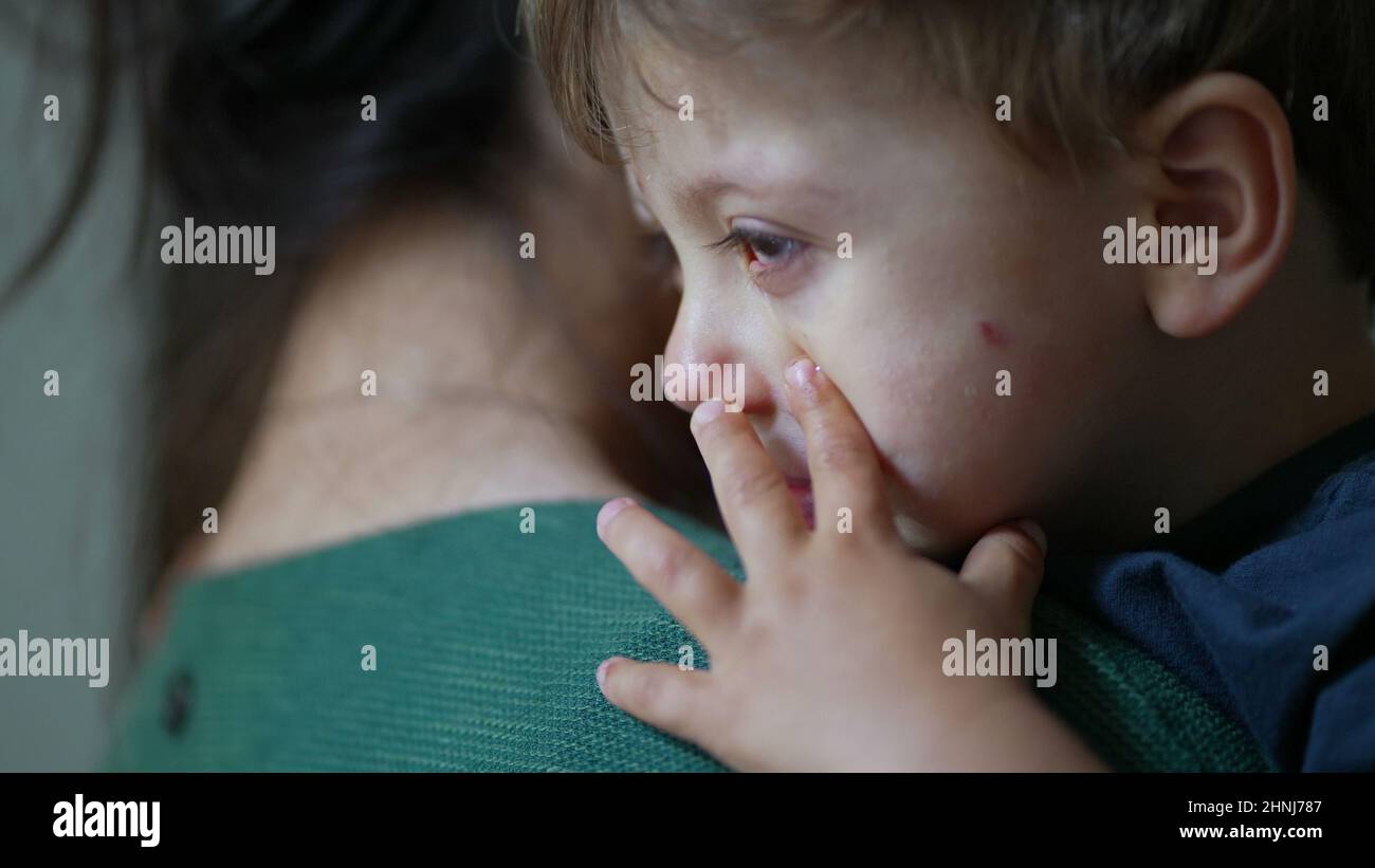 Child wiping tears of mother hi-res stock photography and images - Alamy