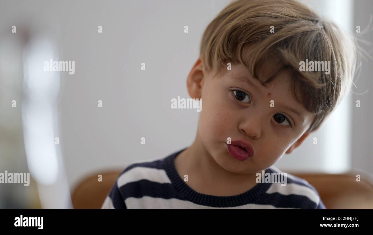 One adorable child portrait face smiling cute small boy Stock Photo - Alamy
