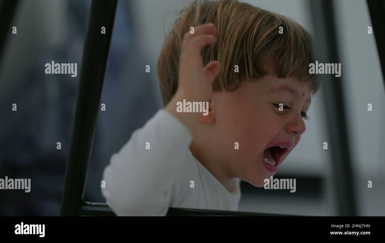 One crying little toddler child cries desperately doing a tantrum Stock ...