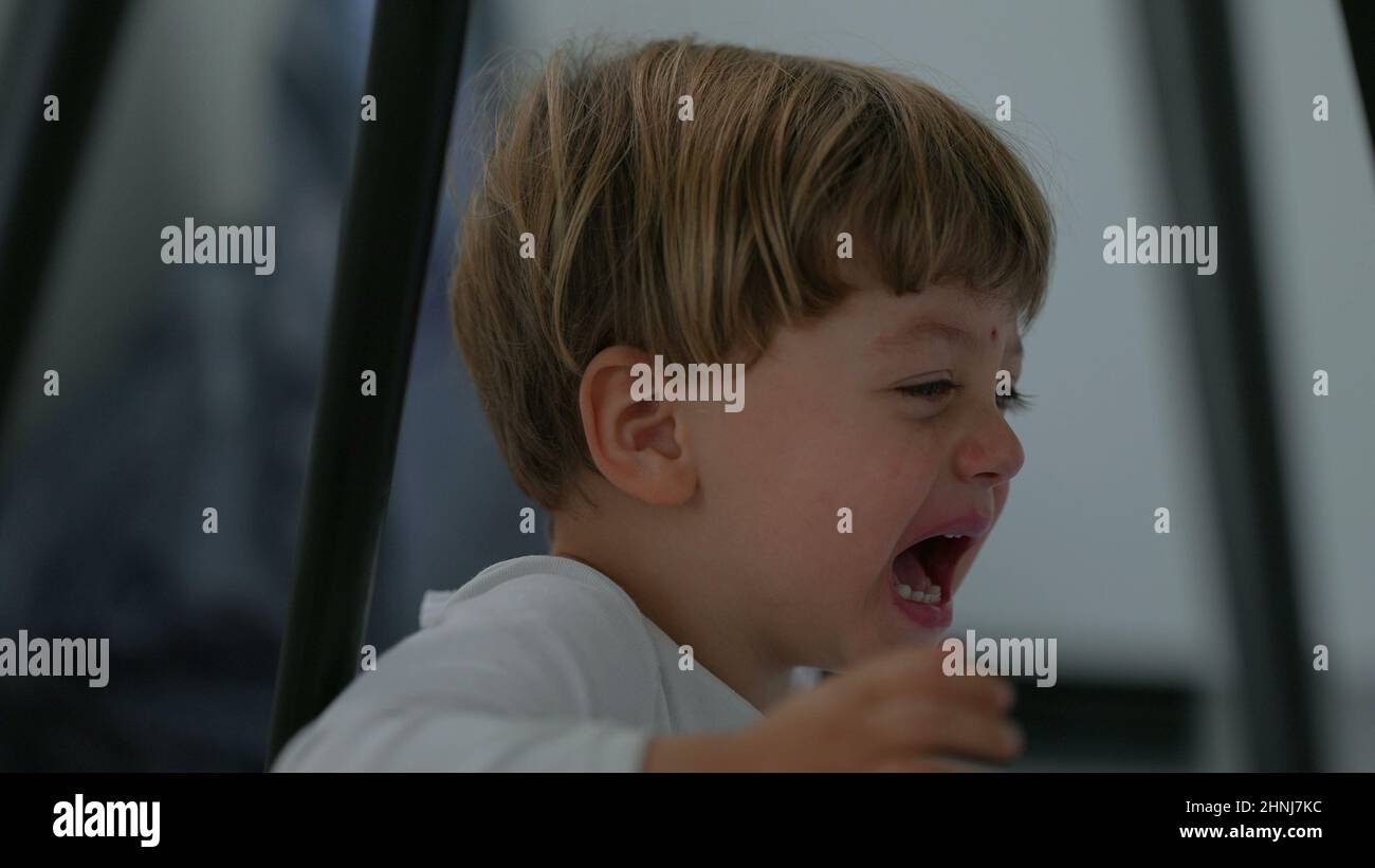 One crying little toddler child cries desperately doing a tantrum Stock ...