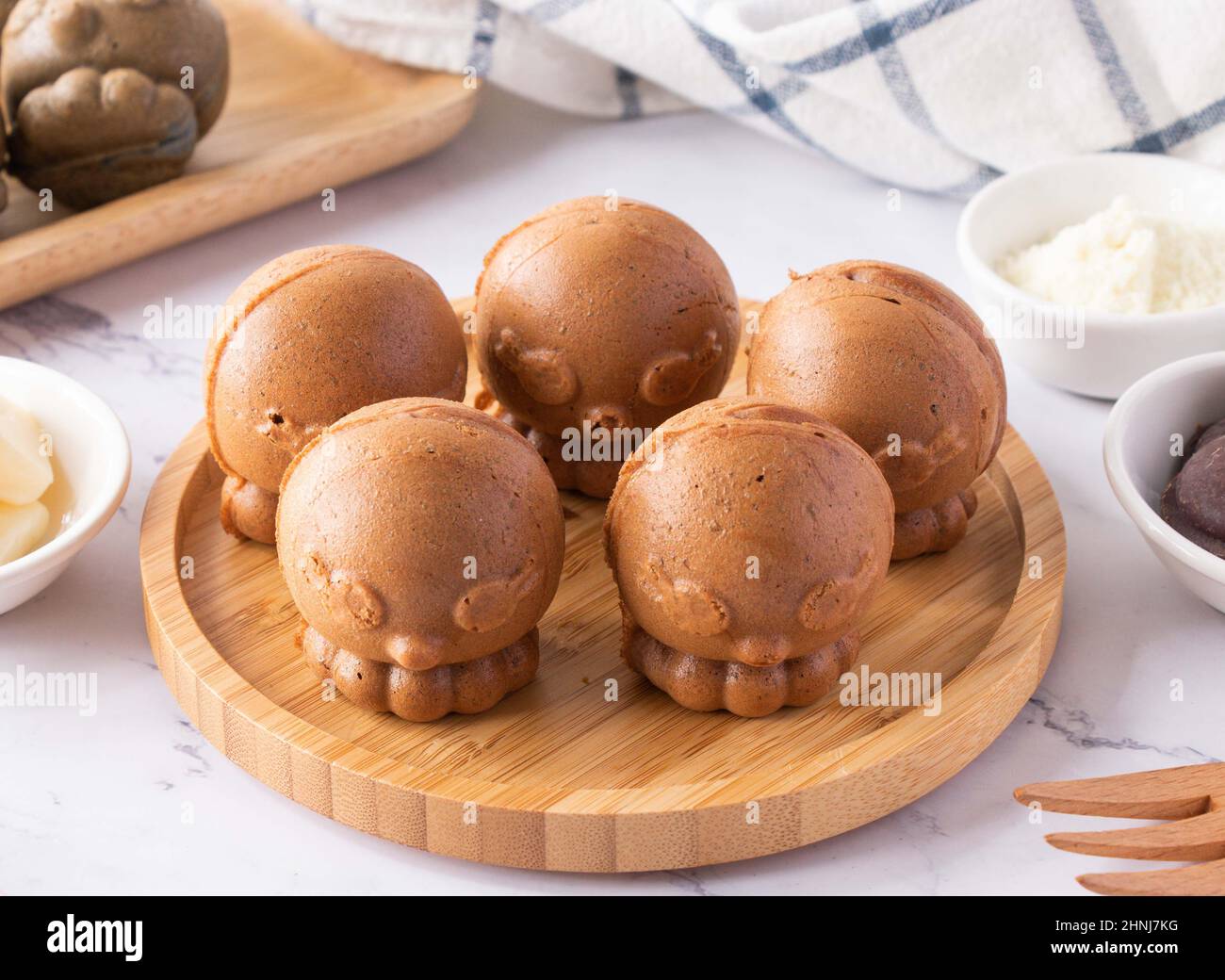 Original Cocoa Chicken Cake teddy bear shape in wooden plate on marble ...