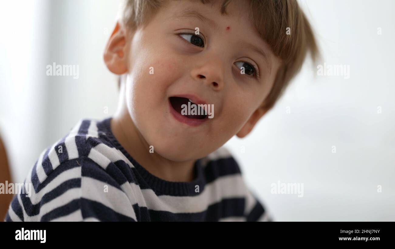 One little boy shakes head and hair Stock Photo - Alamy