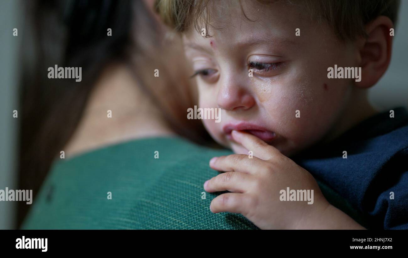 One tearful little boy crying mother consoling child Stock Photo - Alamy One tearful little boy crying mother consoling child Stock Photo - Alamy
