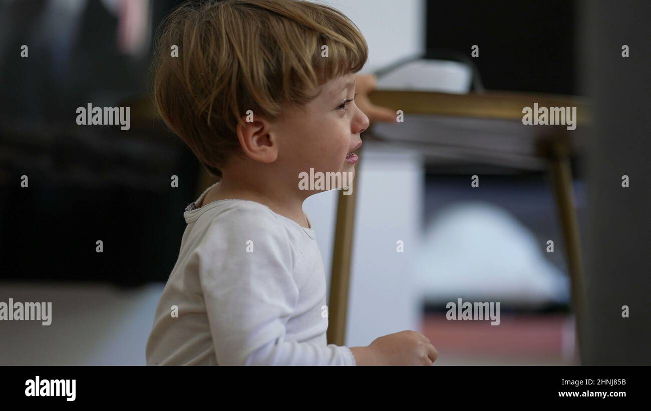 Tearful child hurtful small boy crying Stock Photo - Alamy