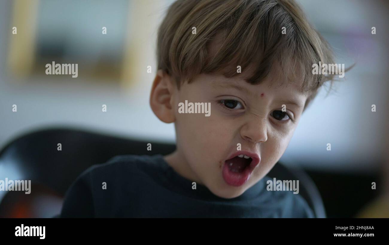 Upset little boy yelling angry child screaming Stock Photo - Alamy