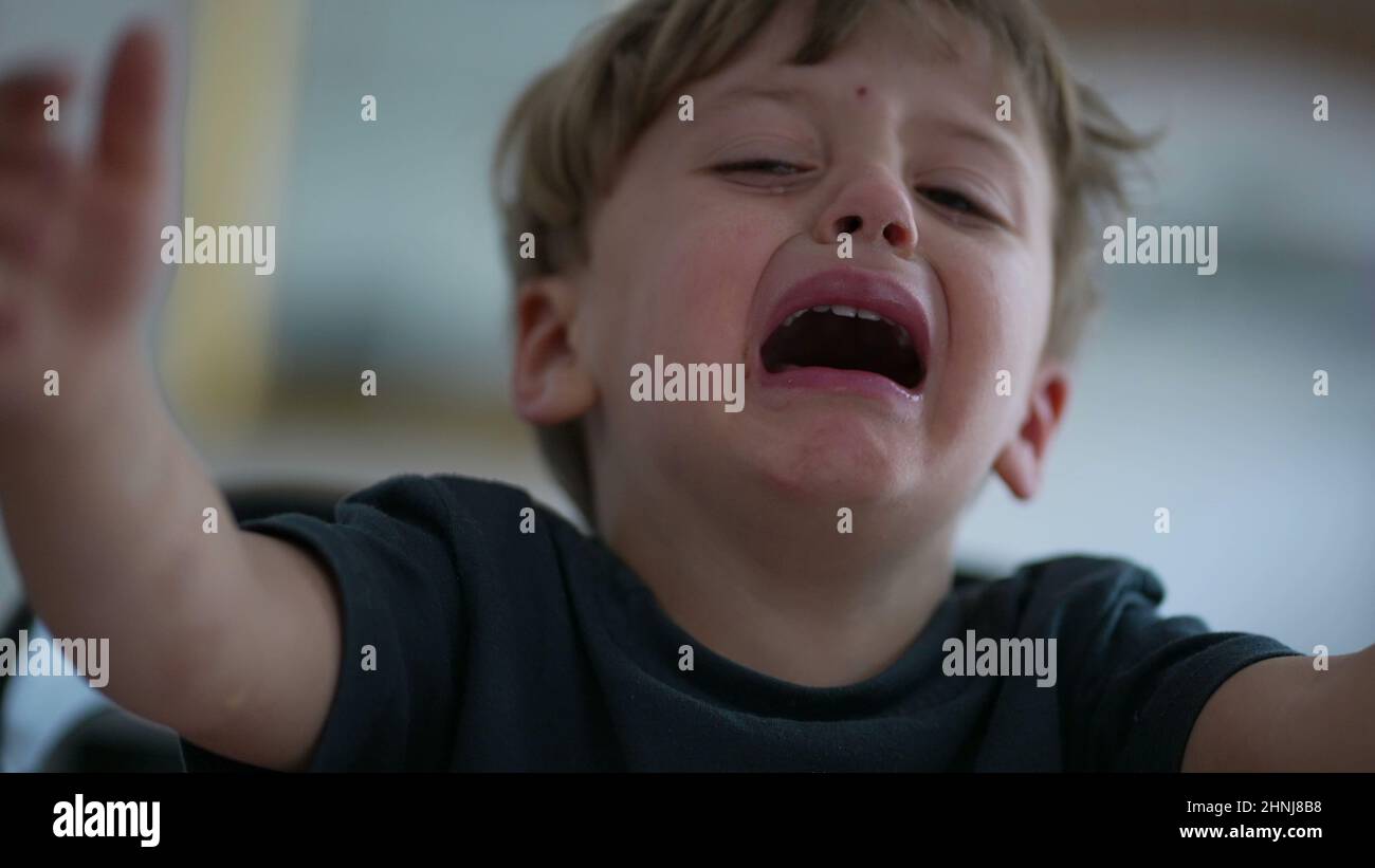 Upset child crying one small boy cries Stock Photo - Alamy