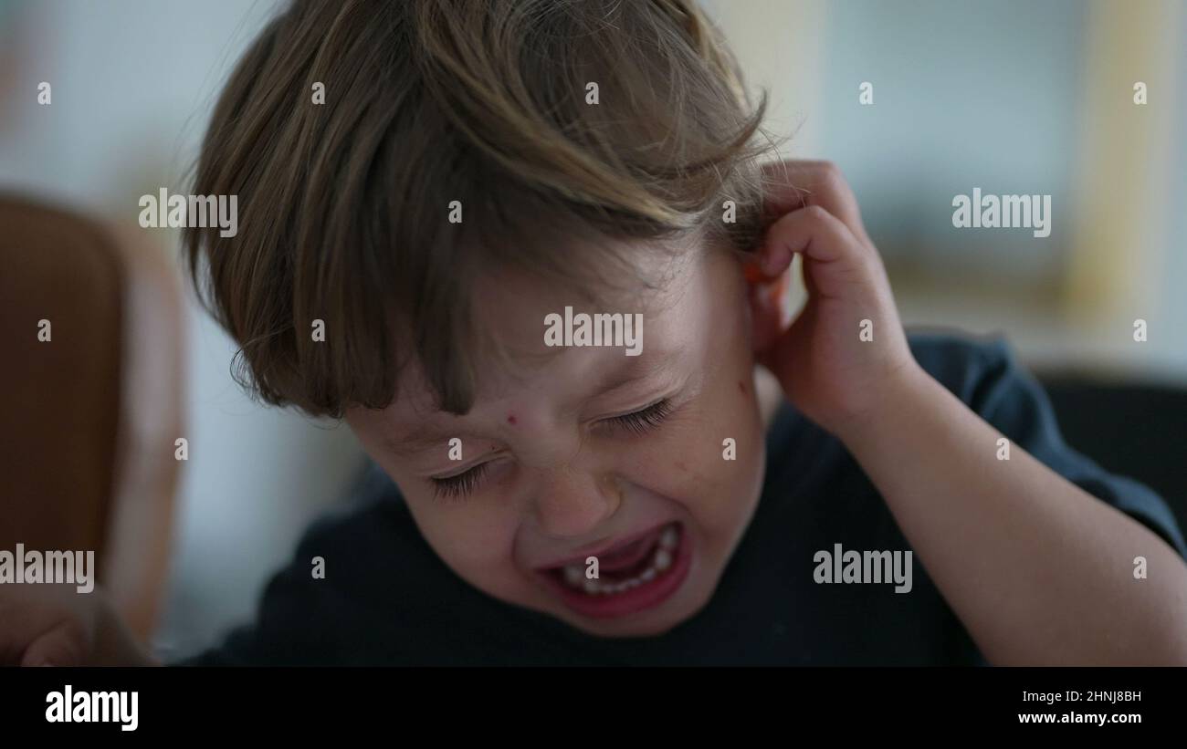 Upset child crying one small boy cries Stock Photo - Alamy