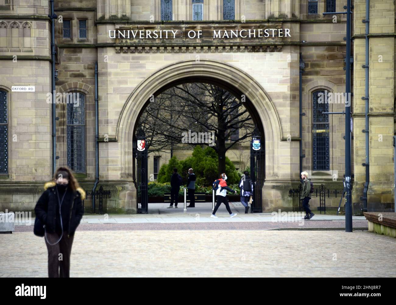 People walk in front of Whitworth Hall, University of Manchester ...